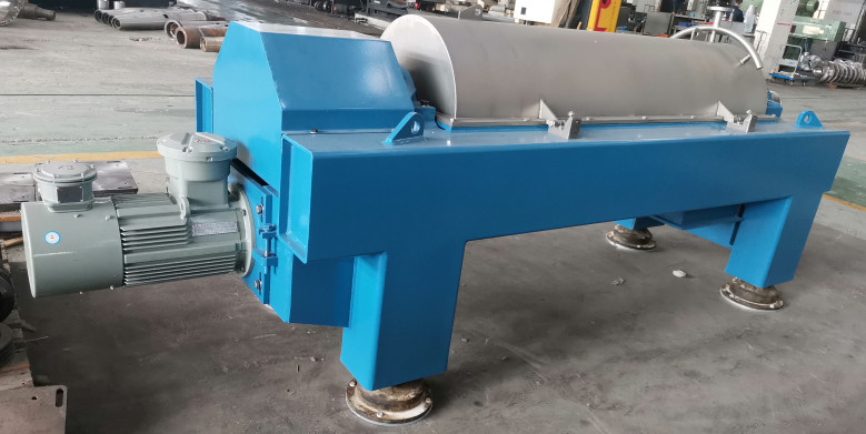 Two-phase scroll discharge decanter centrifuge for centrifugal dewatering