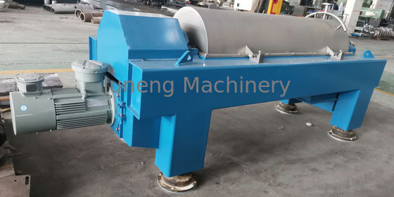 Two-phase scroll discharge decanter centrifuge for centrifugal dewatering